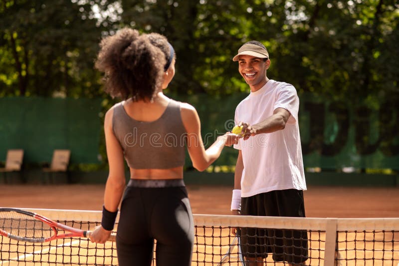 Two Young People Having a Workout at Tennis Court Stock Photo - Image ...
