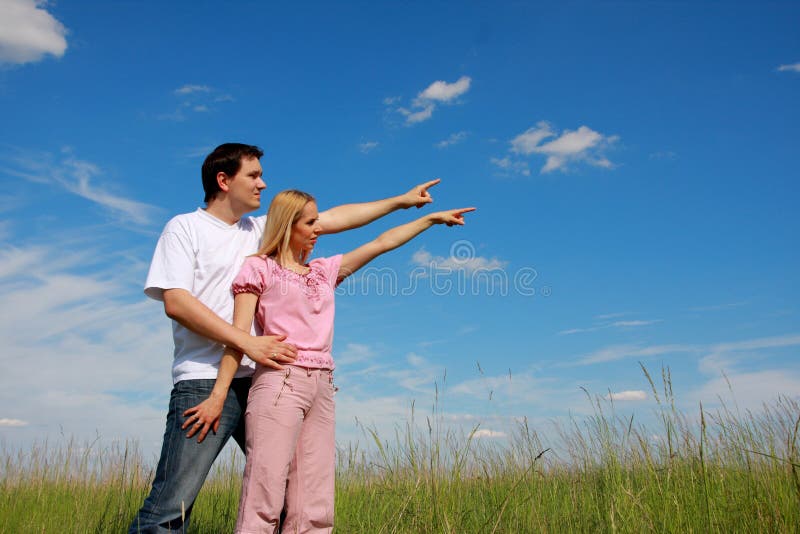Two Young People Pointing Fingers Stock Photo - Image of show, cloud ...