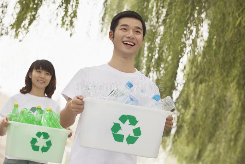 Two Young People Recycling Plastic Bottles Royalty Free Stock Photo ...
