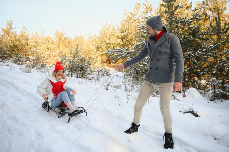 Two Young People Sliding on a Sled Stock Image - Image of season ...