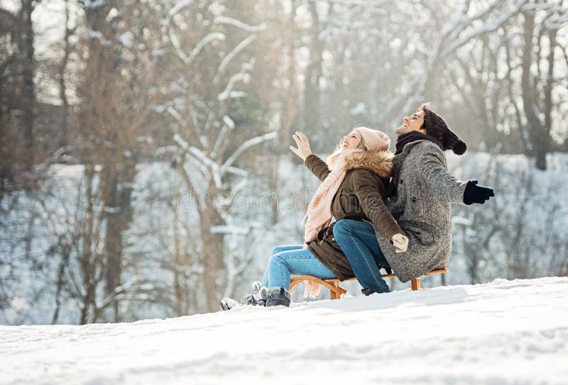 Two Young People Sliding on a Sled Stock Image - Image of cute, sledge ...