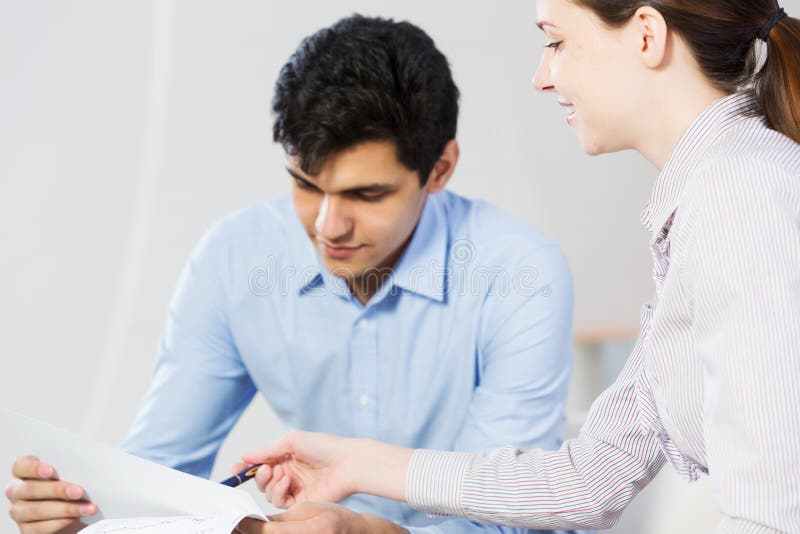 Two Young People Working As Partners Stock Photo - Image of studying ...