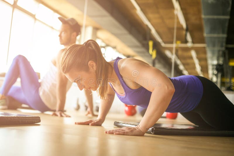 Two Young People Workout in Healthy Club. Stock Image - Image of self ...