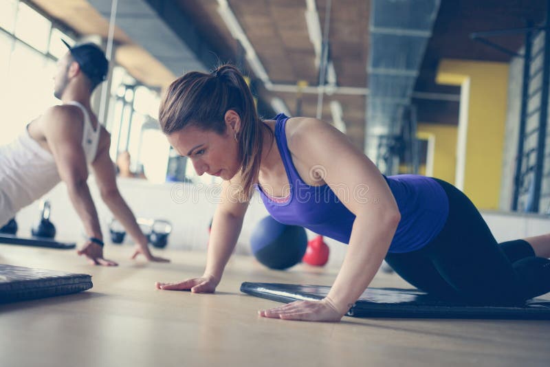Two Young People Workout in Healthy Club. Stock Photo - Image of adult ...