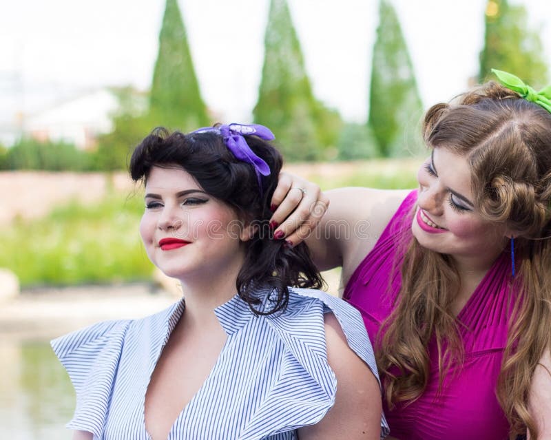 Two Young Plus Size Model Sitting by the Lake Stock Photo - Image of ...