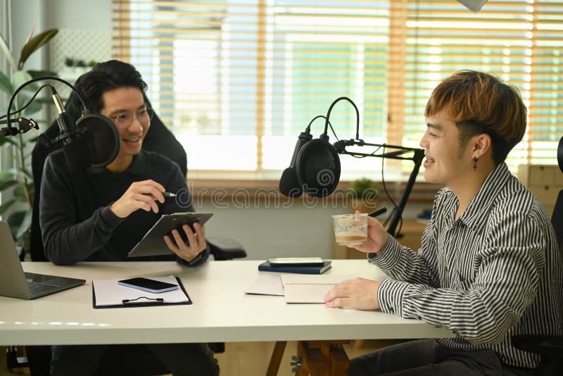 Two Young Podcaster Using Condenser Microphone Recording or Streaming ...