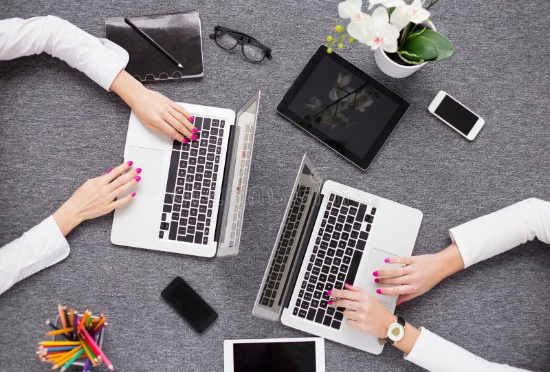 Two Young Professionals Working with Computer, View from Above Stock ...