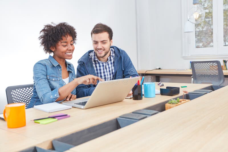 Two Young Programmers As a Team at the Laptop Stock Photo - Image of ...