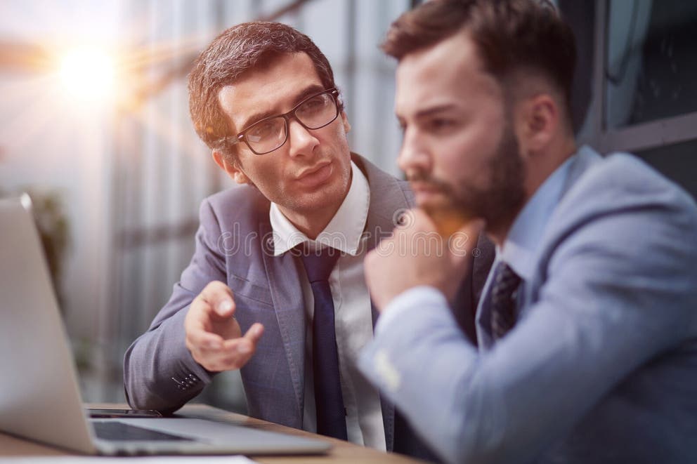 Colleagues Talking, Working on Project Together in the Office Stock ...