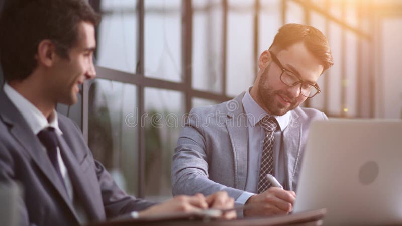 Colleagues Talking, Working on Project Together in the Office Stock ...