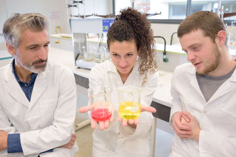 Two Young Researchers Carrying Out Experiments in Lab Stock Image ...