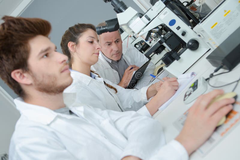 Two Young Scientific Researchers in Laboratory Stock Image - Image of ...