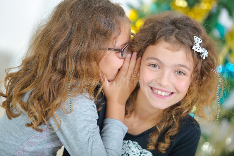 Two Young Sisters at Christmas Stock Photo - Image of face, looking ...