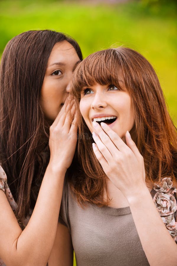 Two young speaking women stock image. Image of european - 20245723