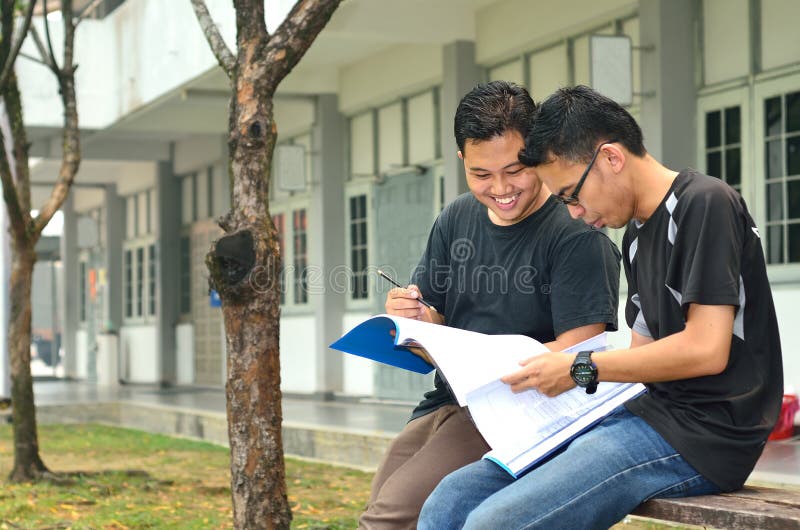 Two Young Student Reading Books Stock Image - Image of boys, copyspace ...
