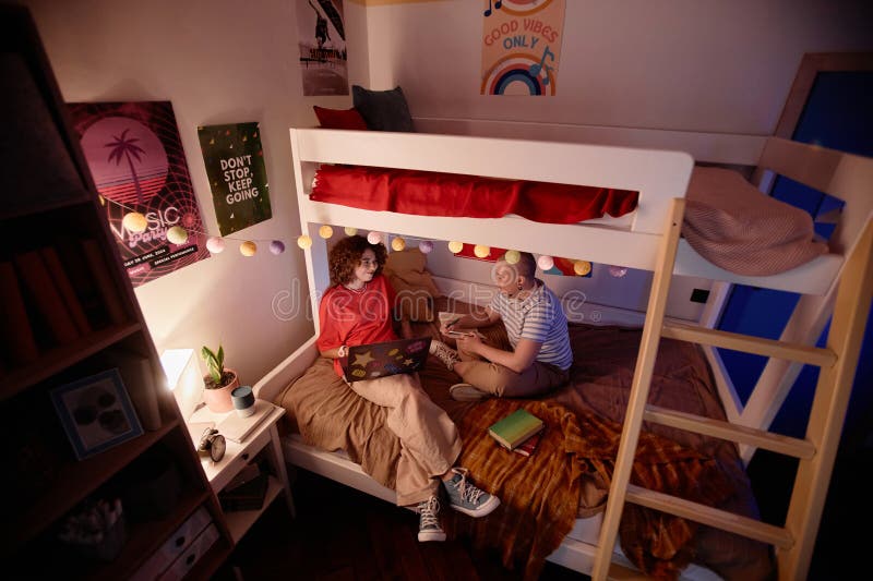 Two Young Students Doing Homework Together on Bunk Bed Stock Photo ...