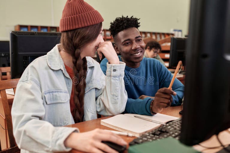 Two Young Students Using Computer in Library Stock Photo - Image of ...