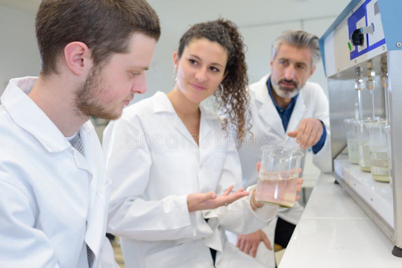 Two Young Students Working on Science Project in Lab Stock Photo ...