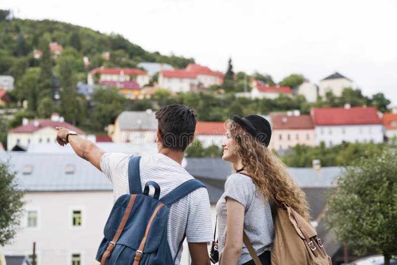 Two Young Tourists with Camera in the Old Town. Stock Image - Image of ...