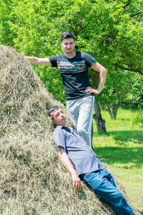 Two Young Village Boys Rest on the Nature. Stock Image - Image of ...