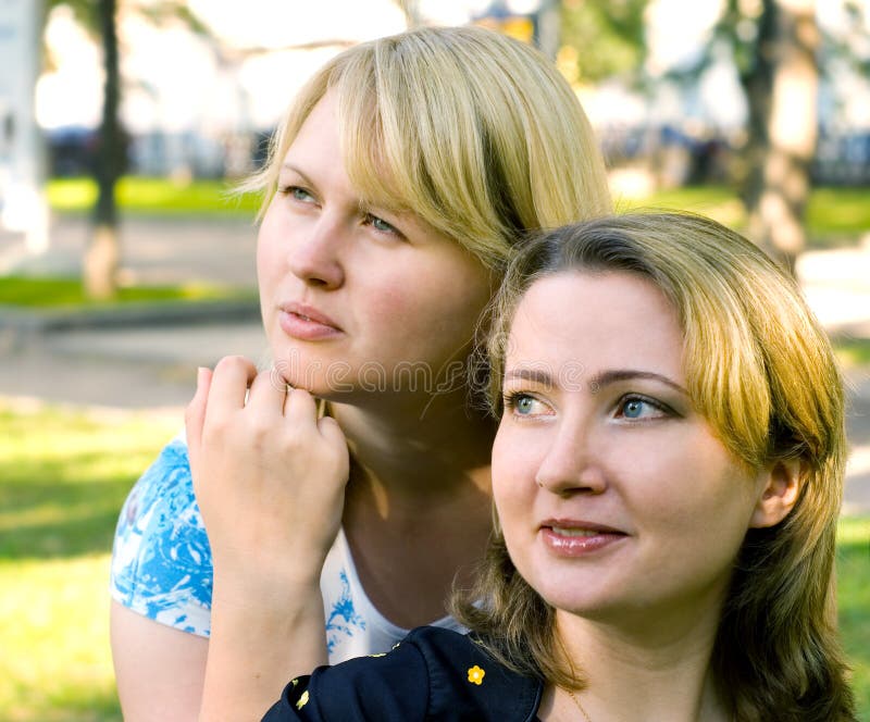 Two young women stock photo. Image of contact, nature - 5942802