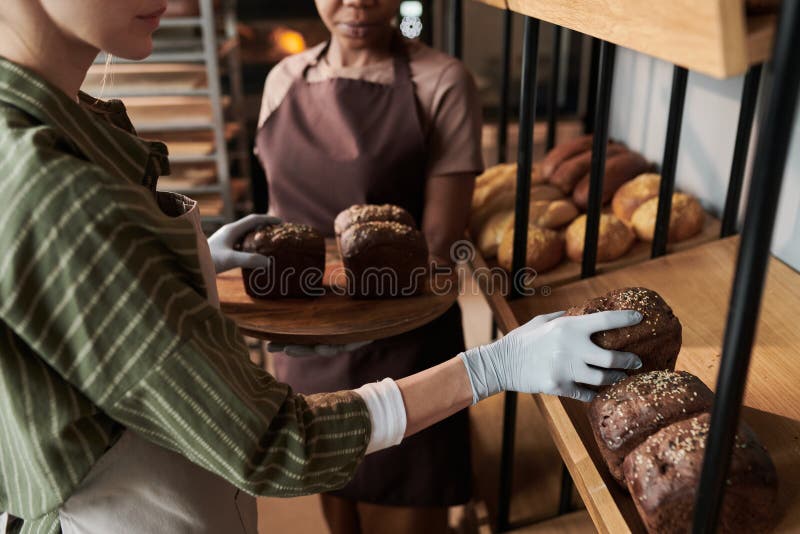 Women working in bakery stock photo. Image of shelf - 219829900