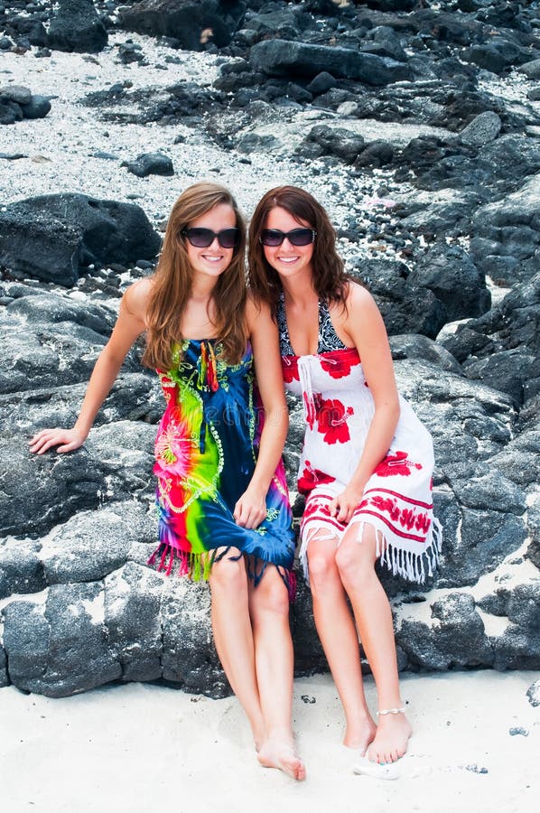 Two Young Women at the Beach Stock Photo - Image of clothes, kona: 22713878
