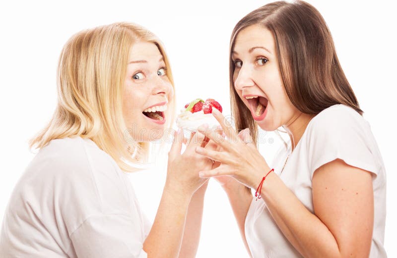 Two Young Women are Eating a Cake Stock Image - Image of coffee, close ...