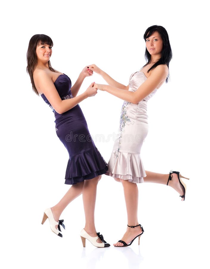 Two Young Women Holding Hands Stock Photo - Image of slim, standing ...