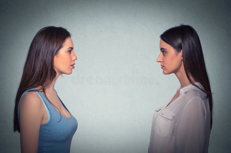 Two Young Women Looking at Each Other Stock Photo - Image of ...
