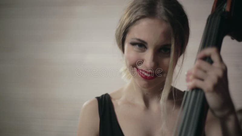 Two Young Women Playing a Musical Instruments Stock Video - Video of ...