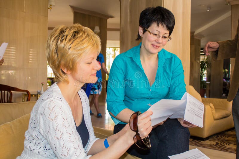 Two Young Women at the Reception Stock Image - Image of indoors ...