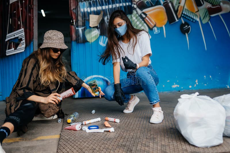 Two Young Women Sorting Garbage. Concept of Recycling. Zero Waste Stock ...