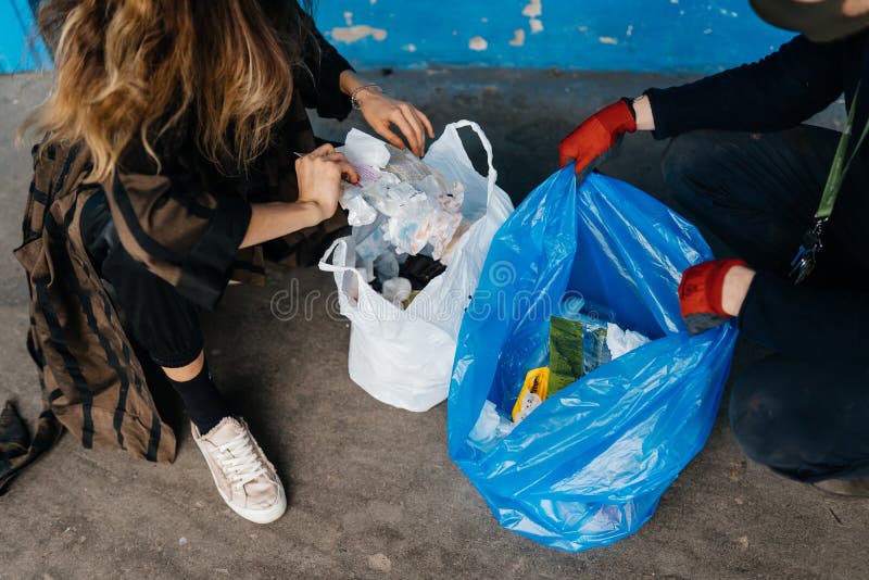 Two Young Women Sorting Garbage. Concept of Recycling. Zero Waste Stock ...
