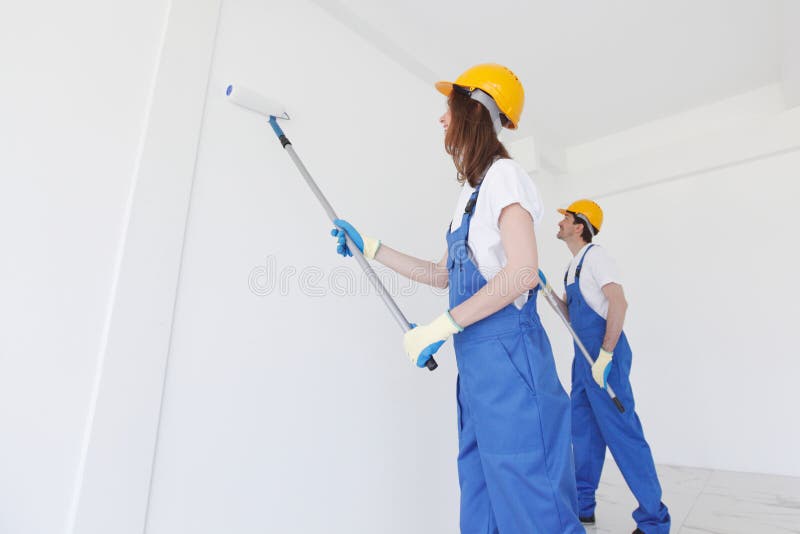 Workers painting the wall stock image. Image of painter - 108661817