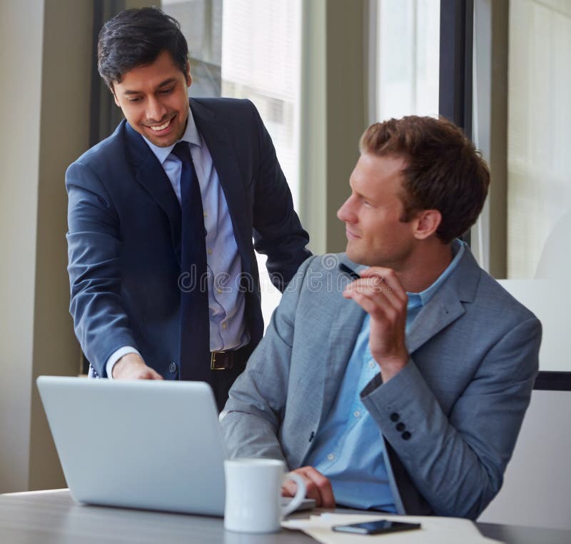 The Deal is Done. Two Businessmen Shaking Hands in the Office. Stock ...