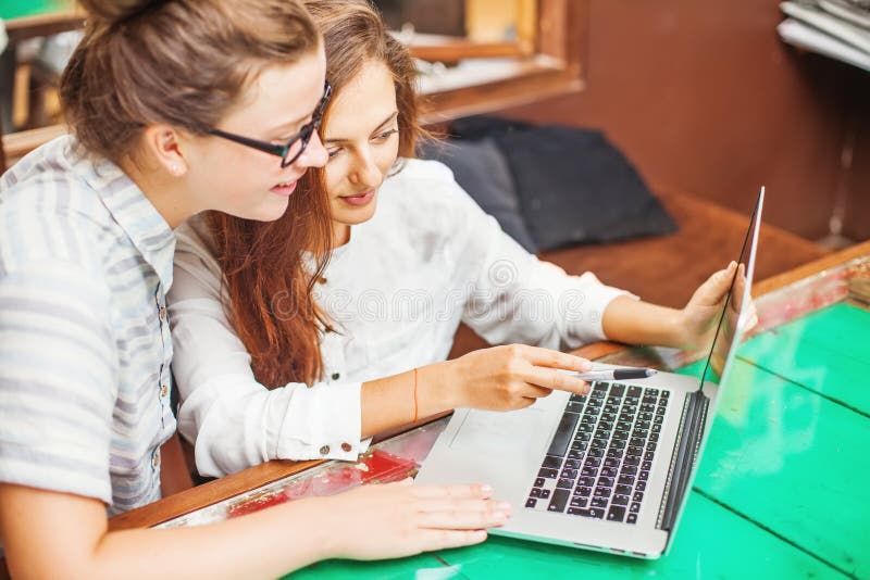 Twowomen Looking at Computer Stock Photo - Image of school, programmer ...