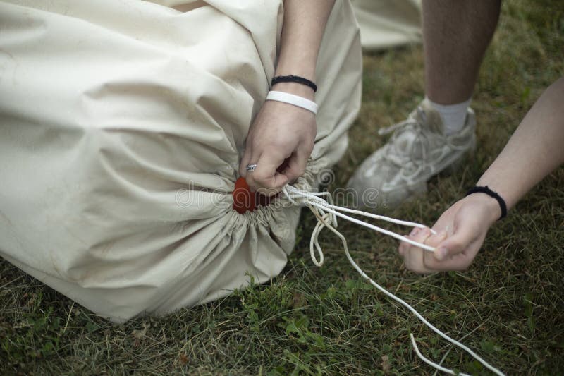 Tying Knot of Rope. Assembling Things Stock Photo - Image of ...