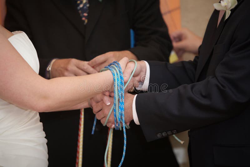 Tying the Knot Wedding Hands Stock Photo - Image of nautical, marriage ...