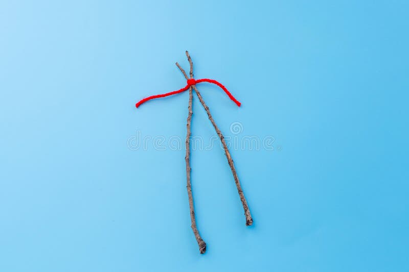 Tying Red Yarn on Two Twigs Together at the End, Craft Made from Sticks ...