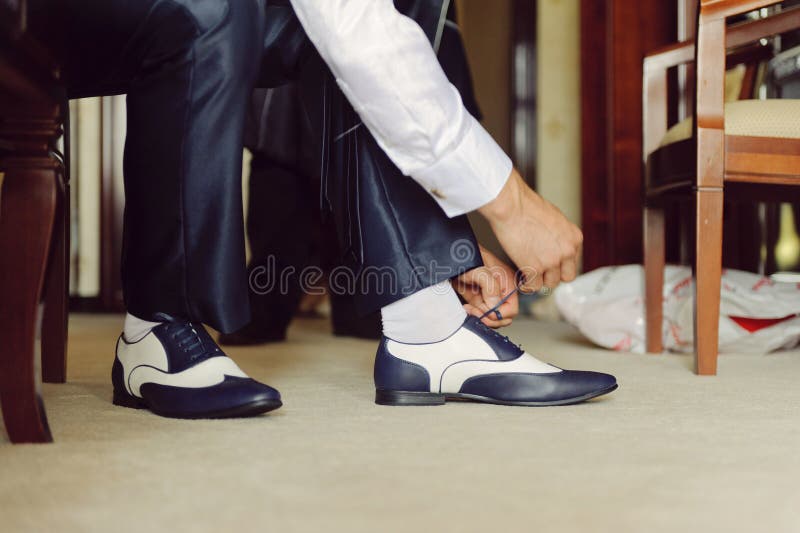 Tying Shoe Strings stock photo. Image of marriage, closeup - 37557204