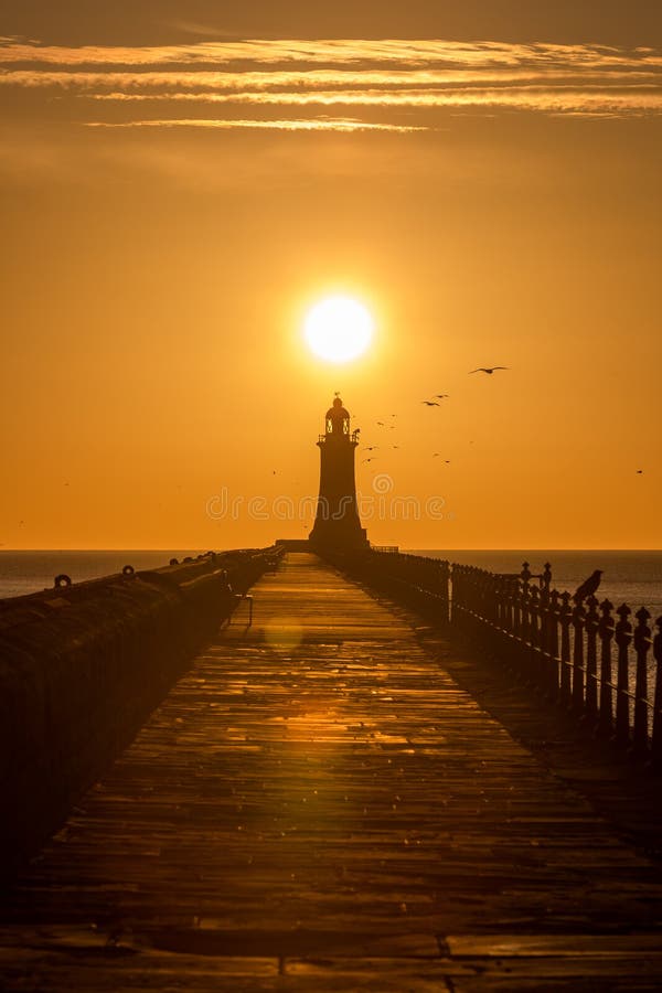 Tynemouth Pier and the Lighthouse with a Beautiful Vibrant Sunrise ...