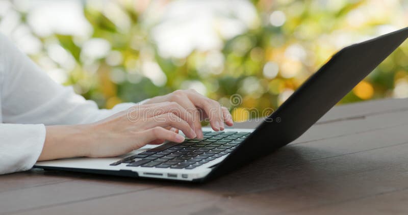 Type on laptop computer stock photo. Image of person - 188650228