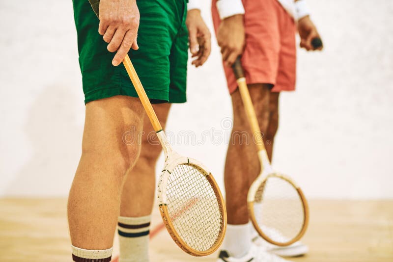 The Type of Racket Makes All the Difference. Two Men Holding Their ...