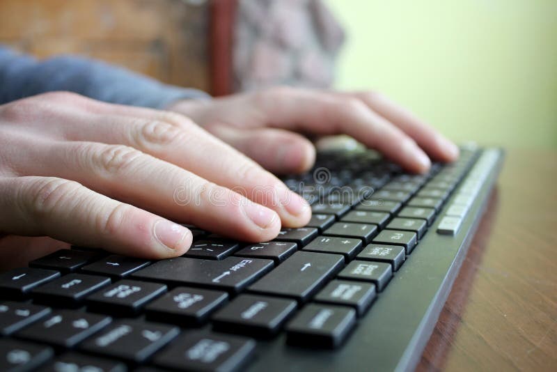 Men`s Hands on the Keyboard. Keyboard. Work on a Laptop. Typing Text ...