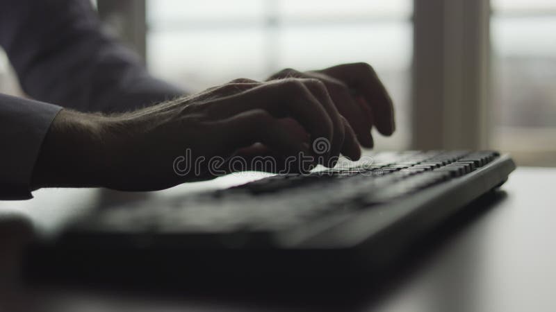 Types on the Keyboard. the Hands of an Office Worker Over the Keyboard ...