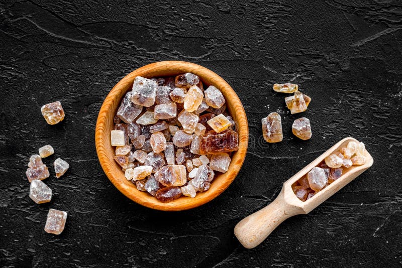 Types of Sugar. Candy Brown Sugar in Bowl and Scoop on Black Background ...
