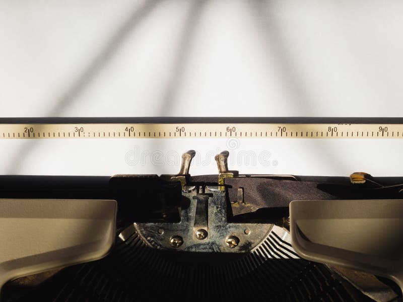 Typewriter and a Blank Sheet of Paper, Shadowed Light Stock Image ...