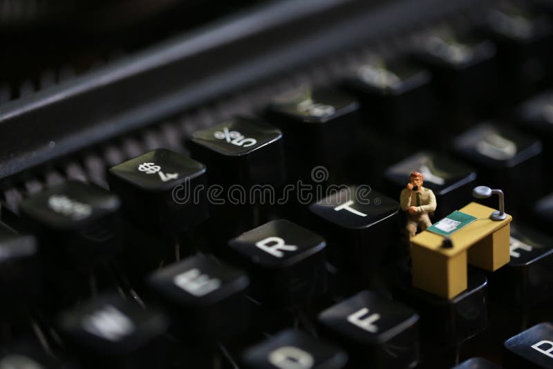 Typewriter with the Figurines in Work Stock Photo - Image of keyboard ...