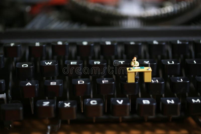Typewriter with the Figurines in Work Stock Photo - Image of keyboard ...